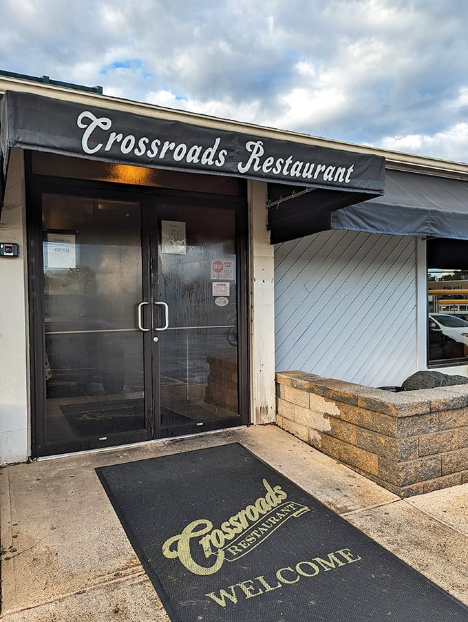 The entrance mat doesn't just say "Welcome"—it's practically whispering "Come in, take a load off, and prepare for a meal that feels like home."