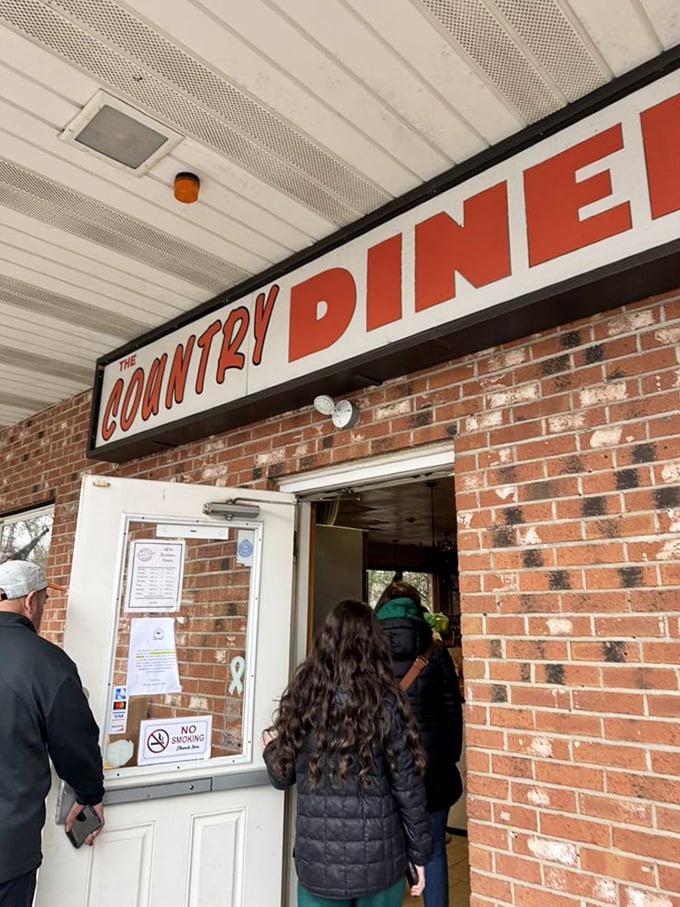 The entrance that's welcomed hungry patrons for years. That line of people? They know something delicious awaits on the other side.