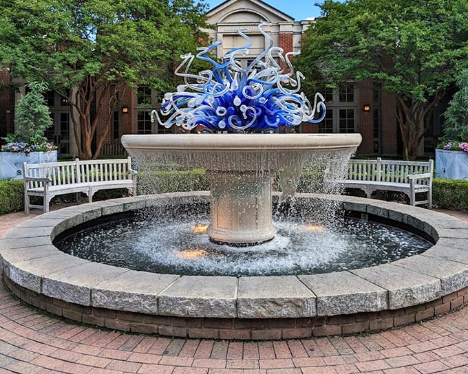 This isn't just a fountain—it's an explosion of blue glass tentacles reaching skyward, turning ordinary water into extraordinary art.