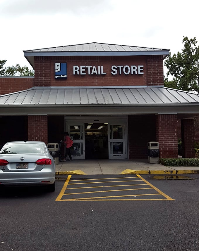 The entrance beckons shoppers with the promise of air conditioning and unexpected treasures, like a portal to an alternate universe where everything's affordable.