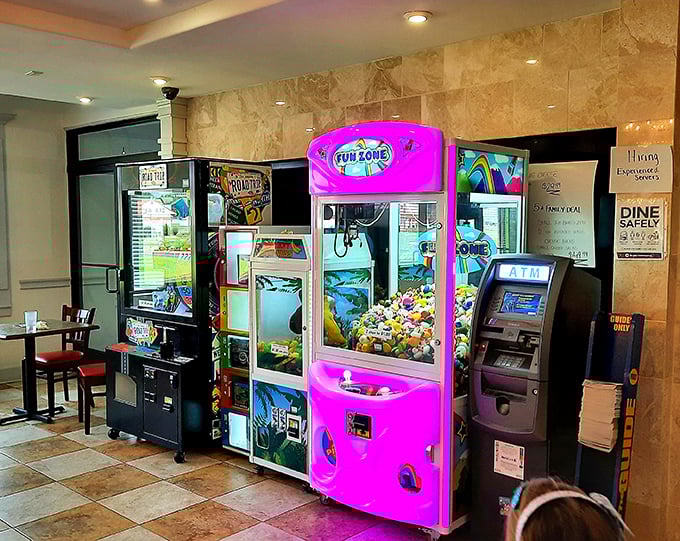 Every family restaurant needs a claw machine—it's where parents teach children important life lessons about probability and disappointment.