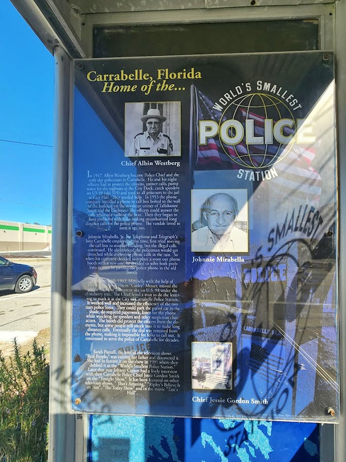 The informational plaque tells the fascinating origin story—from practical weather solution to international tourist destination.