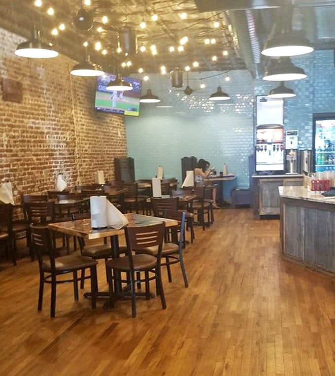 String lights, exposed brick, and wooden floors—the perfect stage for the real star: whatever's on your tray.