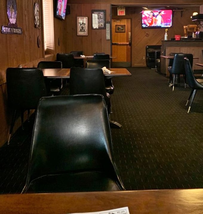 The dining room offers comfortable booth seating and wood-paneled walls—unpretentious surroundings that let the food remain the star of the show.