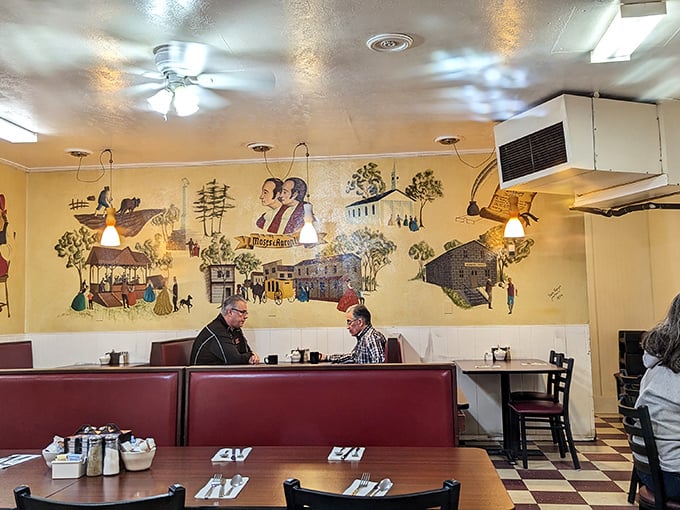The mural doesn't just decorate the wall—it tells stories while you create your own over eggs and coffee.