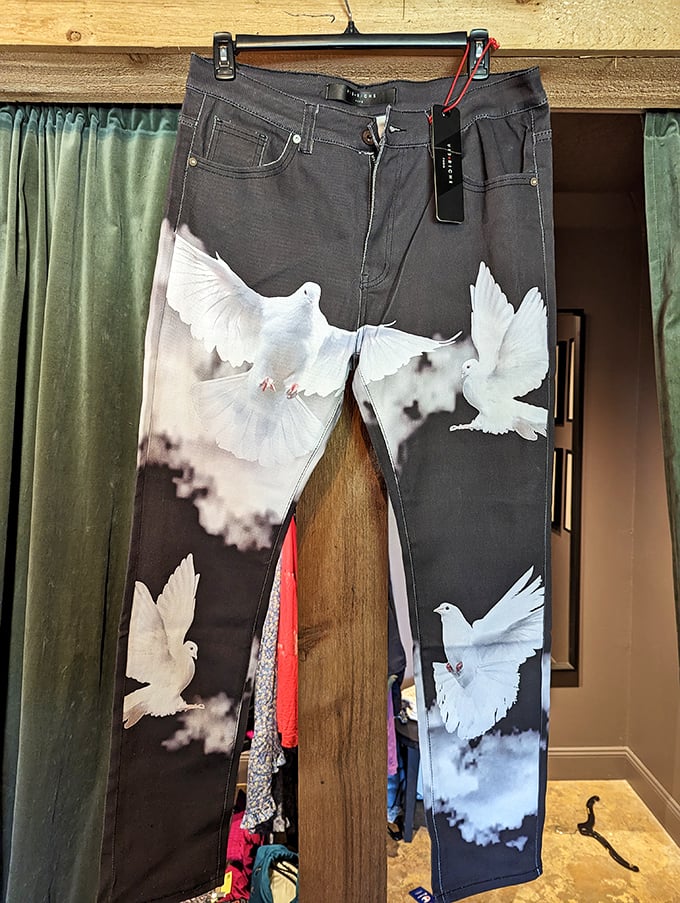 Designer jeans featuring flying doves – when your pants make a statement louder than anything you could possibly say while wearing them.
