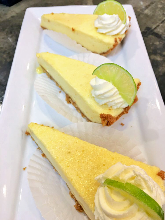 Key lime pie triangles that deliver sunshine on a plate—tangy, sweet, and guaranteed to make you contemplate ordering a second round.