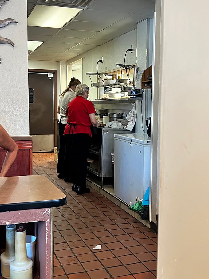 Behind the scenes magic where skilled hands transform simple ingredients into the comfort food masterpieces that keep us coming back.