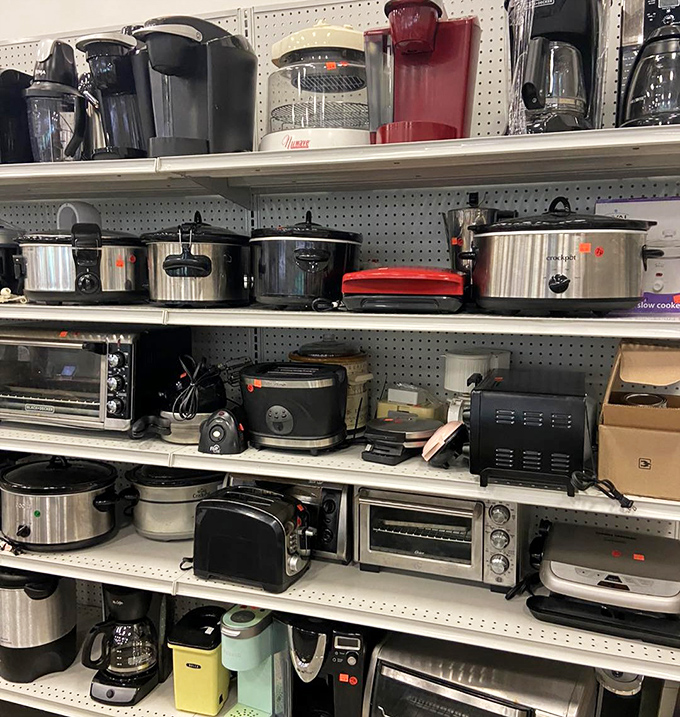 Small appliance heaven—where coffee makers, slow cookers, and toaster ovens await their kitchen comeback. That red Keurig is practically winking at potential buyers.
