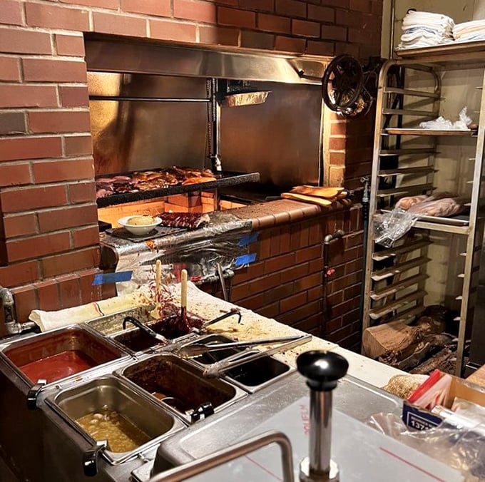 The brick-lined barbecue station—where meat transforms from ordinary to extraordinary through the ancient alchemy of smoke, fire, and patience.