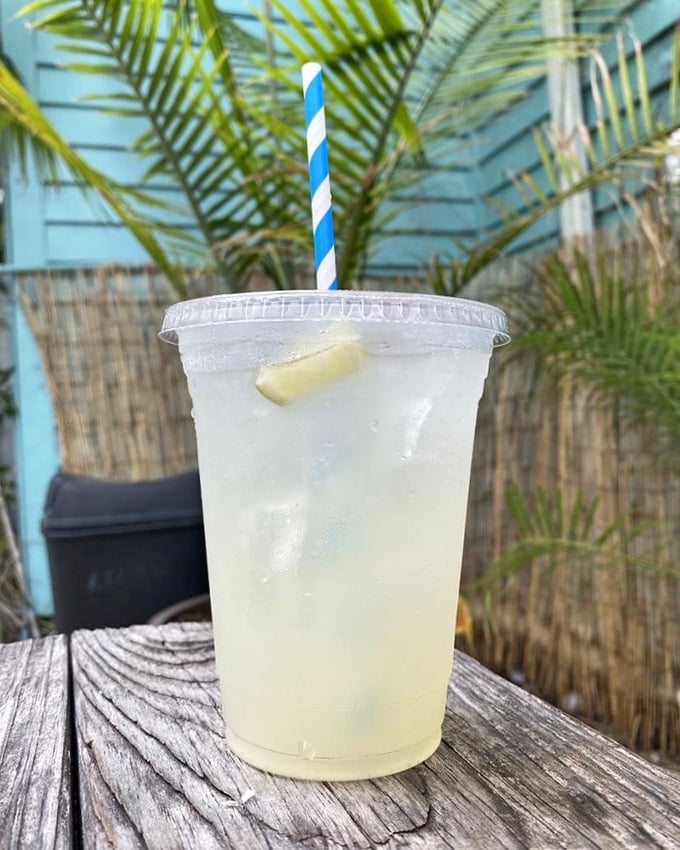 This isn't just lemonade—it's liquid sunshine with a blue straw. The perfect companion for when your mouth needs a vacation from all that rich lobster.