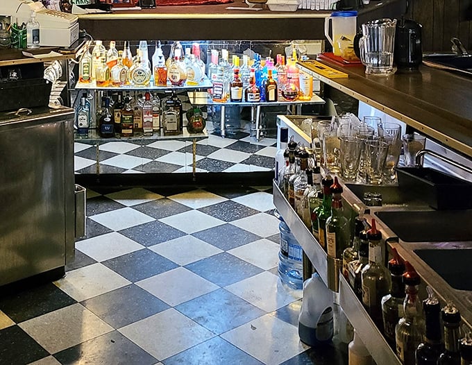 Behind every great sandwich joint is a well-stocked bar—this checkerboard floor has supported generations of satisfied patrons.