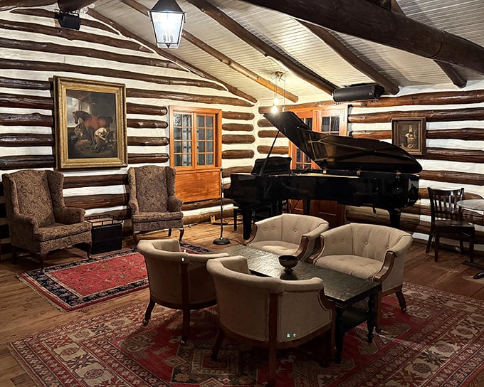 The piano waits patiently for evening melodies while comfortable seating invites pre-dinner drinks and post-meal lingering – resistance is futile.