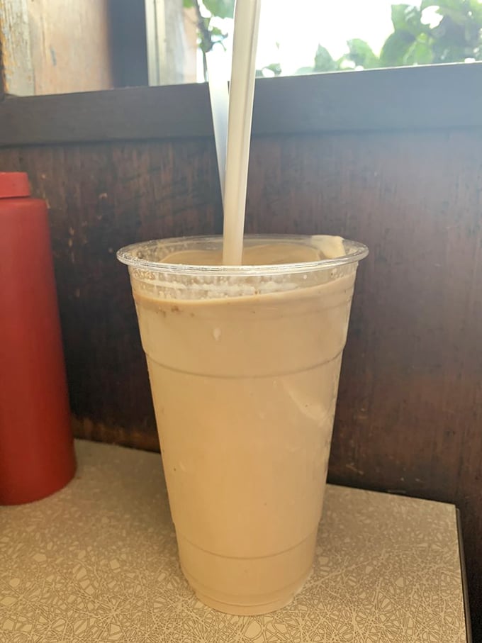 This vanilla shake isn't just a drink—it's a creamy time machine to simpler days when happiness came in a tall glass with a straw.