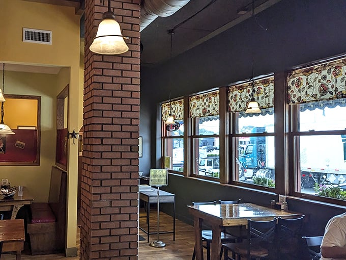 Exposed brick columns and large windows create that perfect balance of rustic charm and natural light—the ideal backdrop for food photography.
