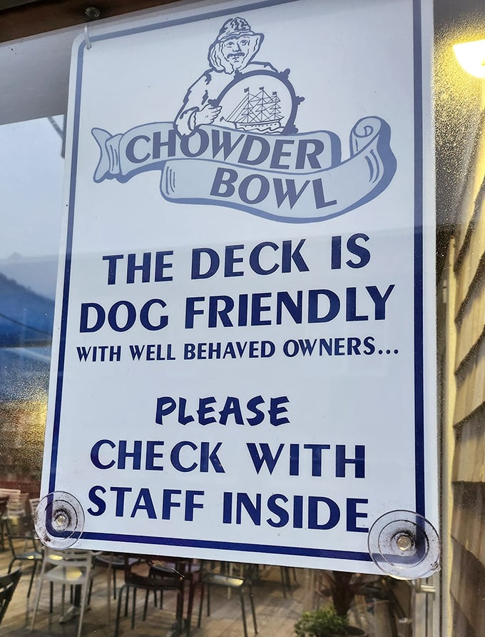 "The deck is dog friendly with well behaved owners..." Finally, a sign that understands who's really in charge of the relationship.