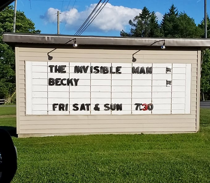 The marquee announces tonight's features with delightful analog charm. No pop-up ads, no autoplay trailers—just letters on a board.