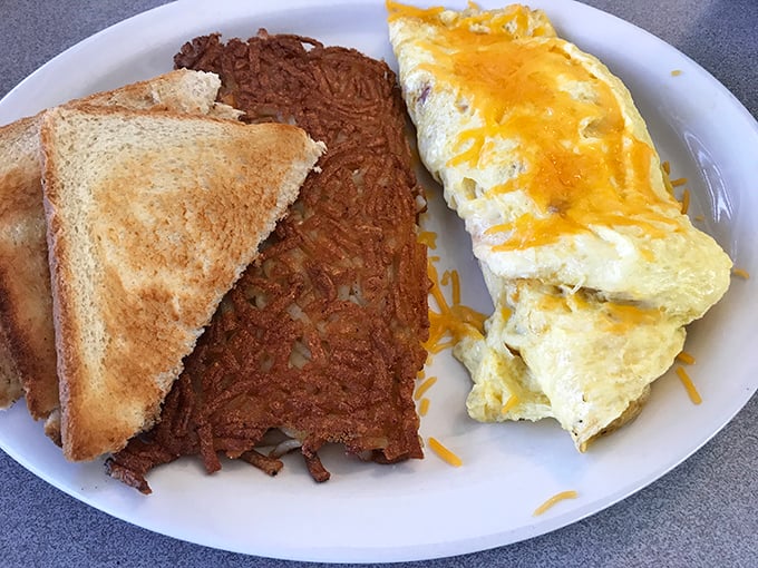 This omelet and hash browns combo is the breakfast equivalent of a perfect high-five—simple, satisfying, and exactly what you needed.