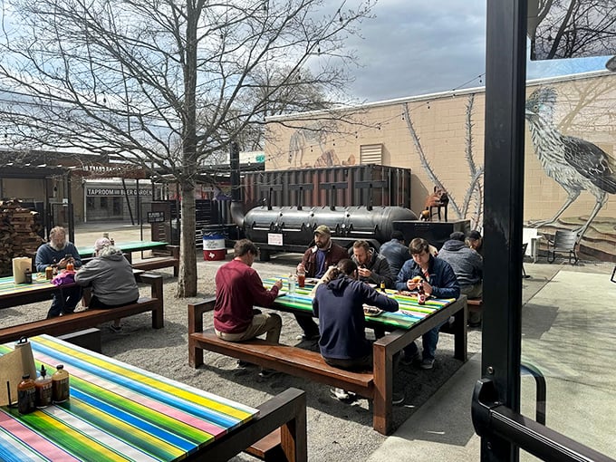 Outdoor dining with a view of the smokers—barbecue theater at its finest. Those picnic tables have witnessed countless moments of meat-induced joy.