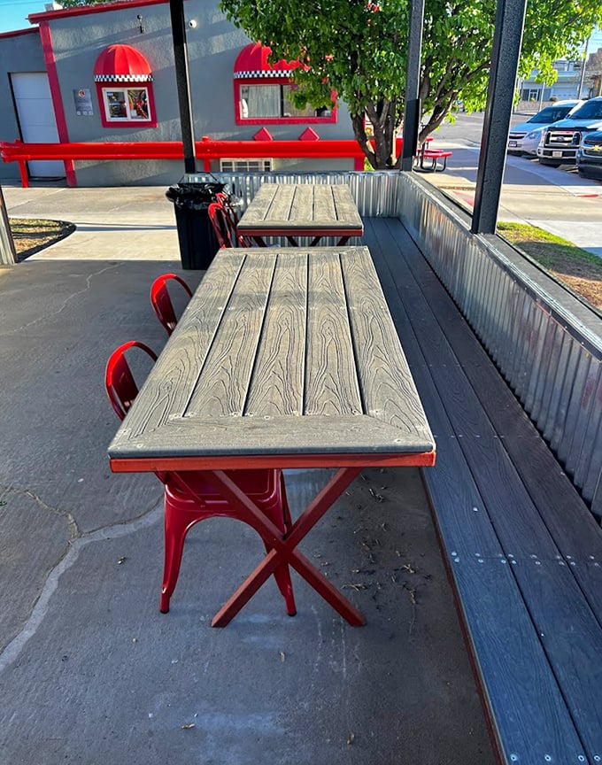The outdoor seating area offers a front-row view of small-town America passing by—perfect for people-watching between bites of burger bliss.