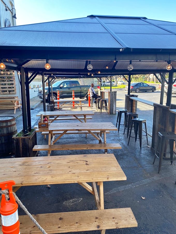Picnic tables under string lights – because barbecue tastes 37% better when eaten outdoors. That's just science.
