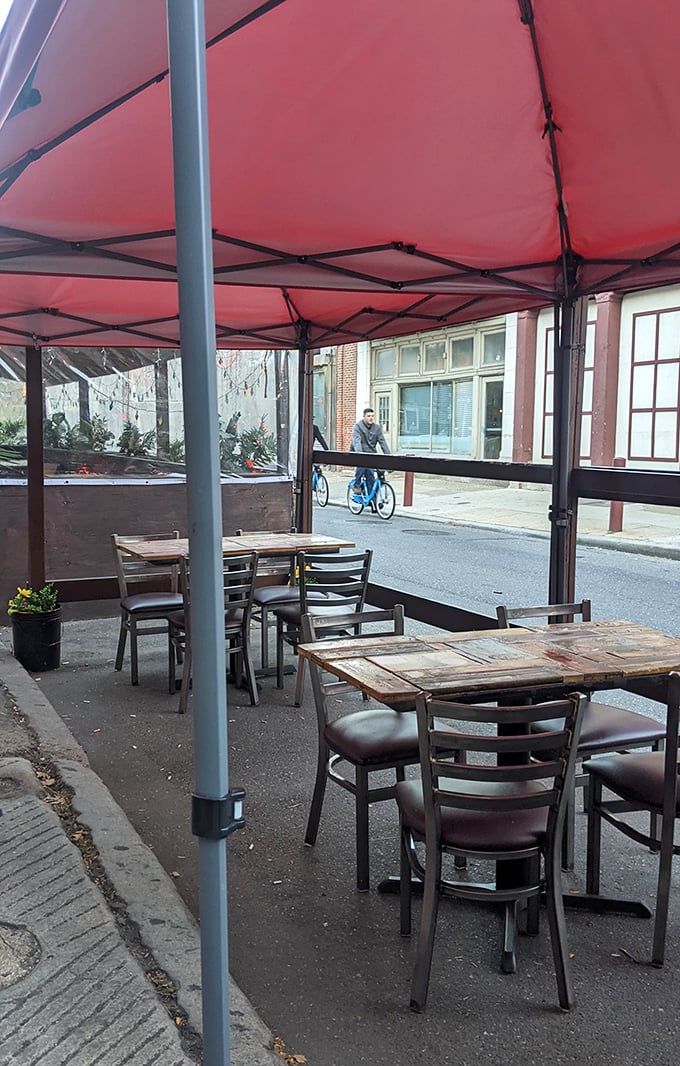 Outdoor seating that turns sidewalk dining into an urban oasis. Fresh air makes everything taste better—science doesn't lie.