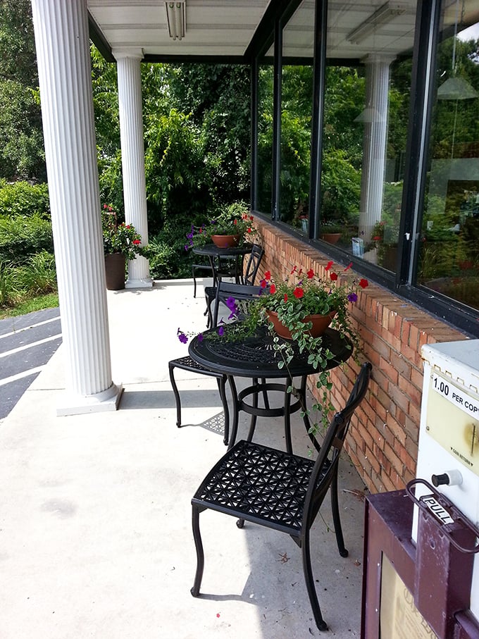 Outdoor seating adorned with flowers—because sometimes you need fresh air with your fresh coffee. Georgia mornings were made for this.