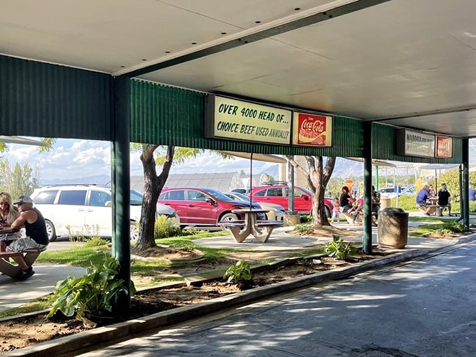 The covered patio boasts vintage Coca-Cola signs and a promise of "4000 head of choice beef" – subtle advertising this is not.