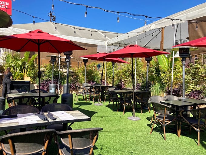 The outdoor patio offers California sunshine by day and string lights by night—proving steakhouse ambiance works in any setting.