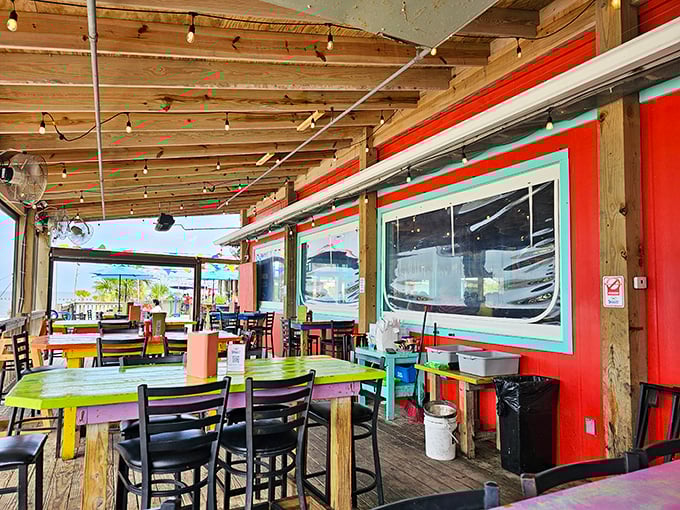 Outdoor seating where every table is the best seat in the house—colorful, casual, and kissed by Gulf breezes.