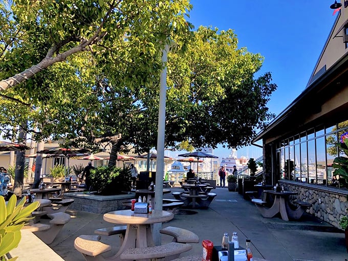 The outdoor patio—where time slows down, seafood tastes better, and nobody's checking their watch or their phone.