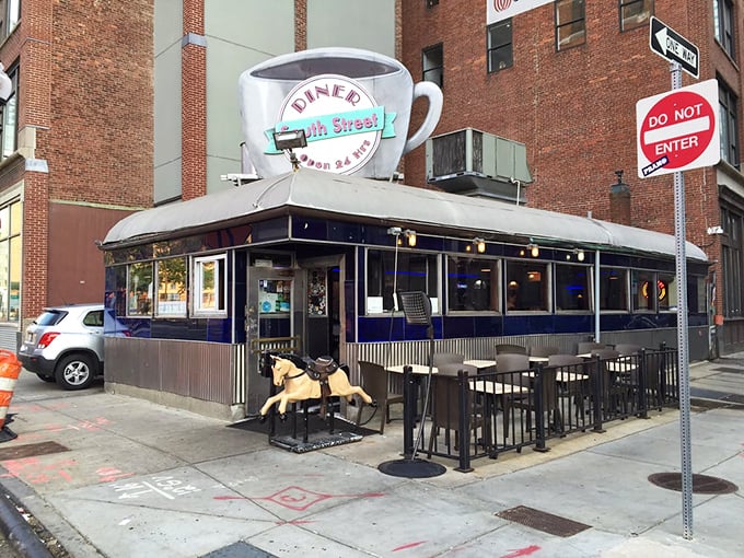 Outdoor seating where you can watch Boston wake up or wind down, with that charming kiddie horse ride adding unexpected whimsy.