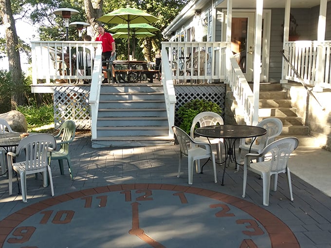 The outdoor seating area features an actual clock face built into the deck—because at the 5 O'Clock Club, it's always time for another round.