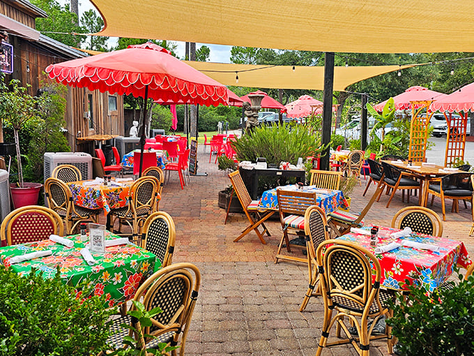 The outdoor patio – where Florida's gentle breezes, colorful umbrellas, and floral tablecloths combine to create the perfect backdrop for lingering lunches.