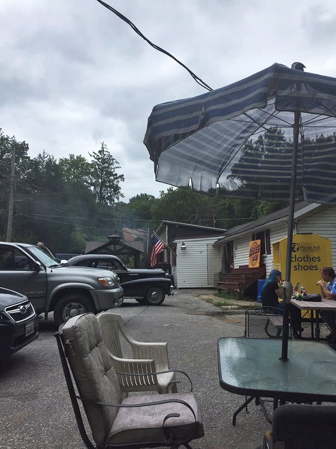 Outdoor seating at Jake's—where the fresh air somehow makes the BBQ taste even better, and strangers become friends over shared sauce recommendations.