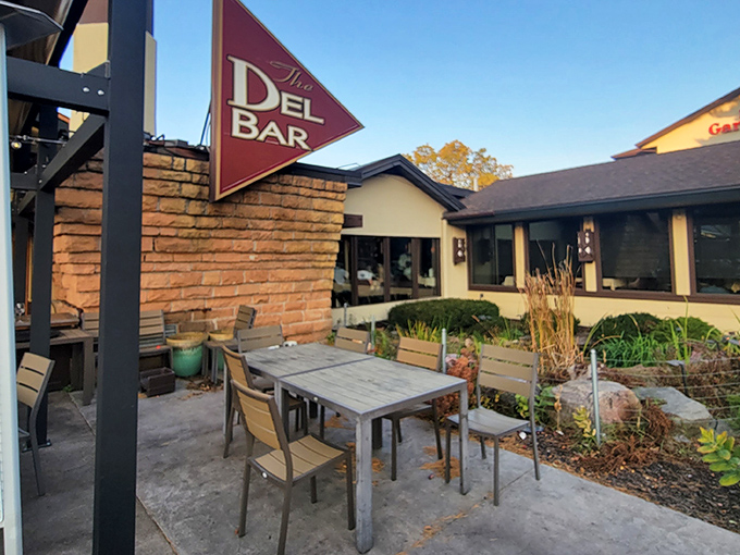 The outdoor patio offers a moment of tranquility before the flavor storm that awaits inside—nature's appetizer.
