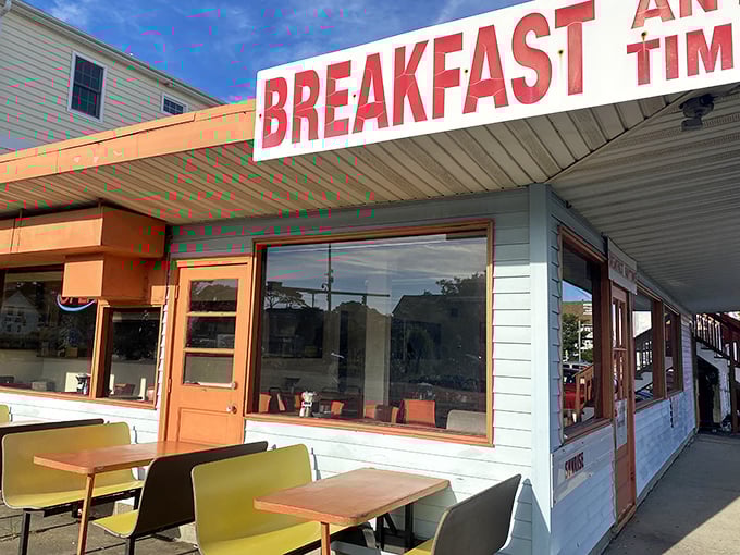 Outdoor seating where the ocean breeze carries hints of bacon and coffee – nature's most intoxicating perfume combination.