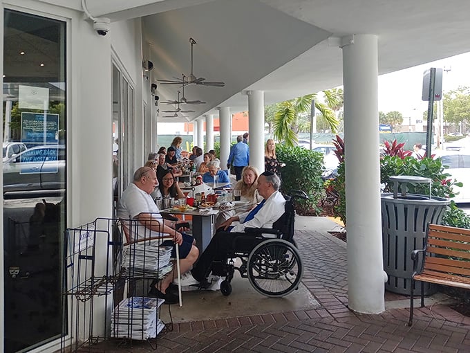 Al fresco dining, Florida-style—where palm trees provide ambiance and the conversation flows as freely as the coffee. A perfect setting for leisurely breakfasts.