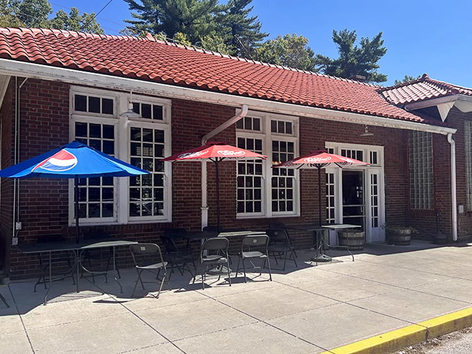 Outdoor seating under cheerful umbrellas—because sometimes barbecue this good deserves to be enjoyed with a side of fresh Missouri air.