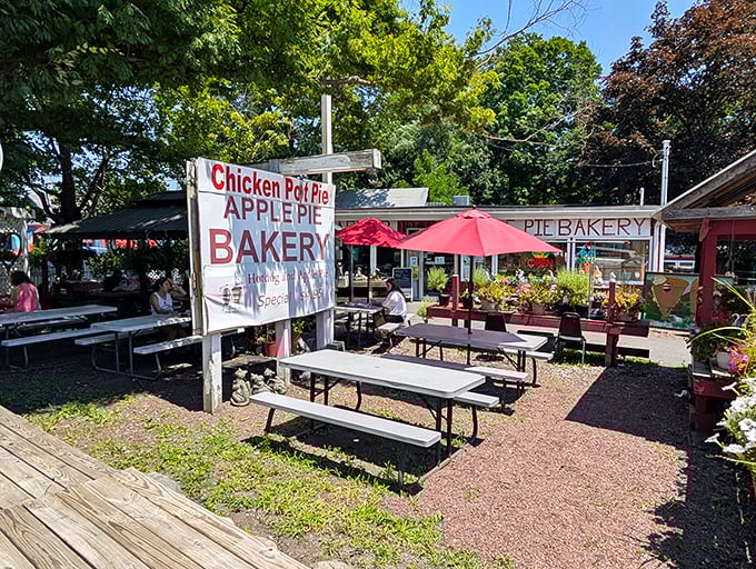 Outdoor seating where memories are made one bite at a time. The sign doesn't lie—chicken pot pie and apple pie are indeed the stars here.