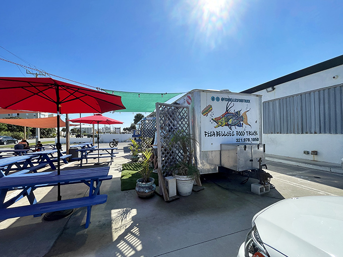 Paradise found: colorful umbrellas, picnic tables, and the promise of seafood that will haunt your dreams for weeks to come.