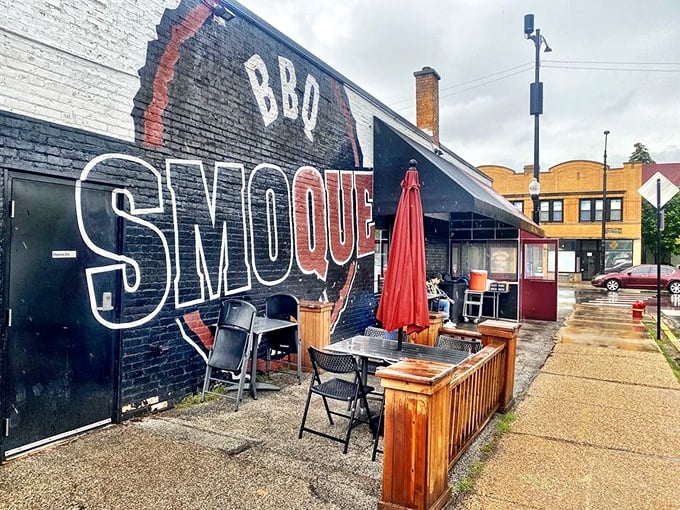 The side patio—where summer barbecue dreams come true under cheerful red umbrellas. Even the neighborhood seems happier here.