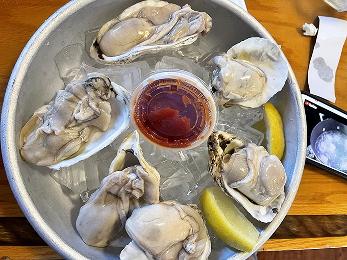 Fresh oysters on ice – ocean treasures that prove Brennan's mastery extends beyond freshwater fare to briny delights from distant shores.