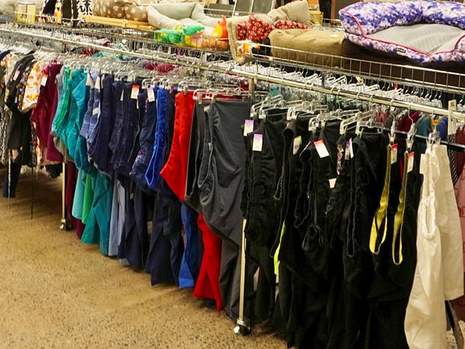 The rainbow organization of pants isn't just practical—it's a visual feast that makes finding your size in your favorite color a treasure hunt with guaranteed rewards.