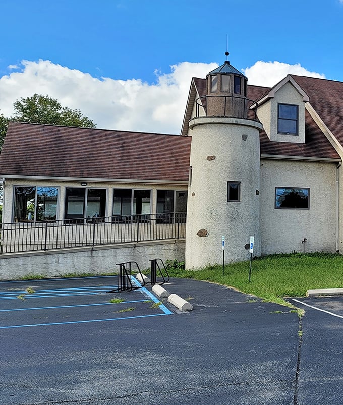 The lighthouse-inspired tower isn't just architectural flair—it's a landmark that helps hungry travelers navigate to seafood paradise.