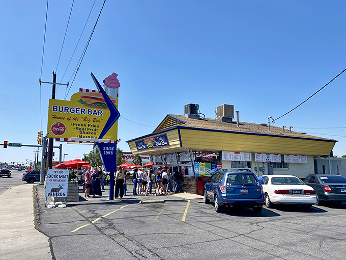The parking lot—where anticipation begins and diet resolutions come to die. Worth every minute of the wait.