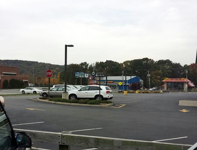 The unassuming parking lot hides retail adventure within. No valet service, but plenty of space to load your unexpected furniture finds.