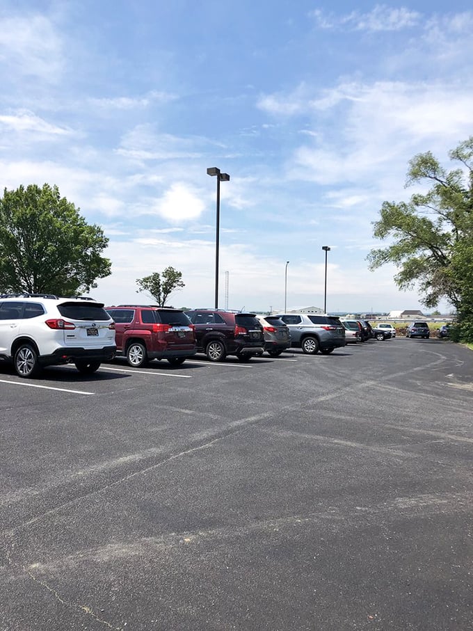 A packed parking lot that tells you everything you need to know—locals vote with their vehicles, and the election isn't even close.