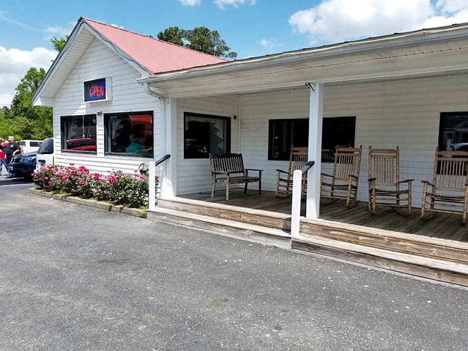 The front porch with rocking chairs isn't just charming – it's strategic. You'll need somewhere to sit and contemplate your food choices.