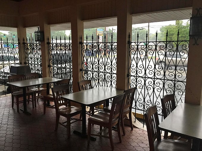 The patio dining area—where the Florida breeze complements your grouper sandwich like nature's own seasoning.